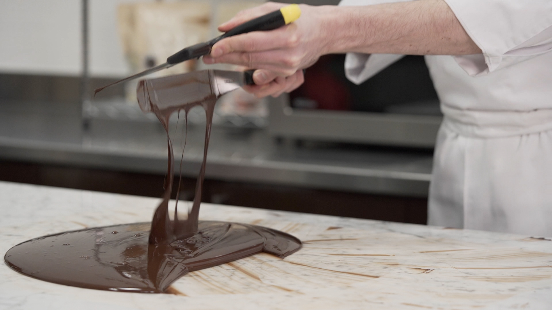 Tempering: The Table Tempering Method | chocolate-academy.com
