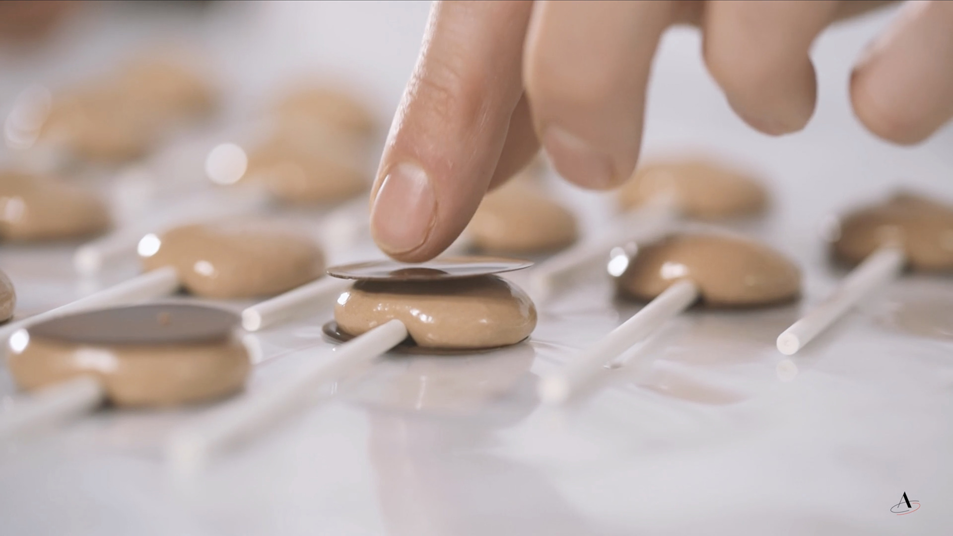 Hazelnut and Milk Chocolate Enrobed Bonbons | chocolate-academy.com